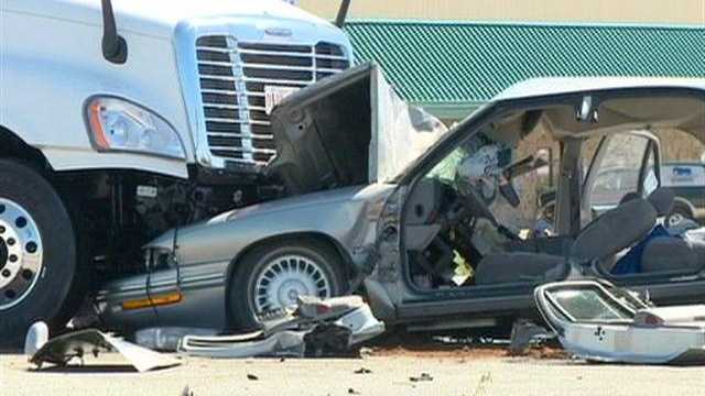 Witnesses: Semi runs over car during crash