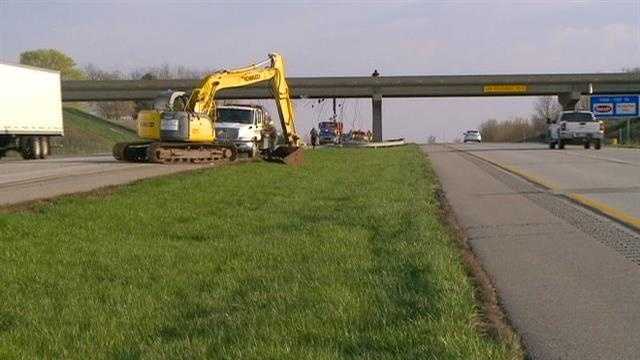 Photos: Bridge torn apart in backhoe crash