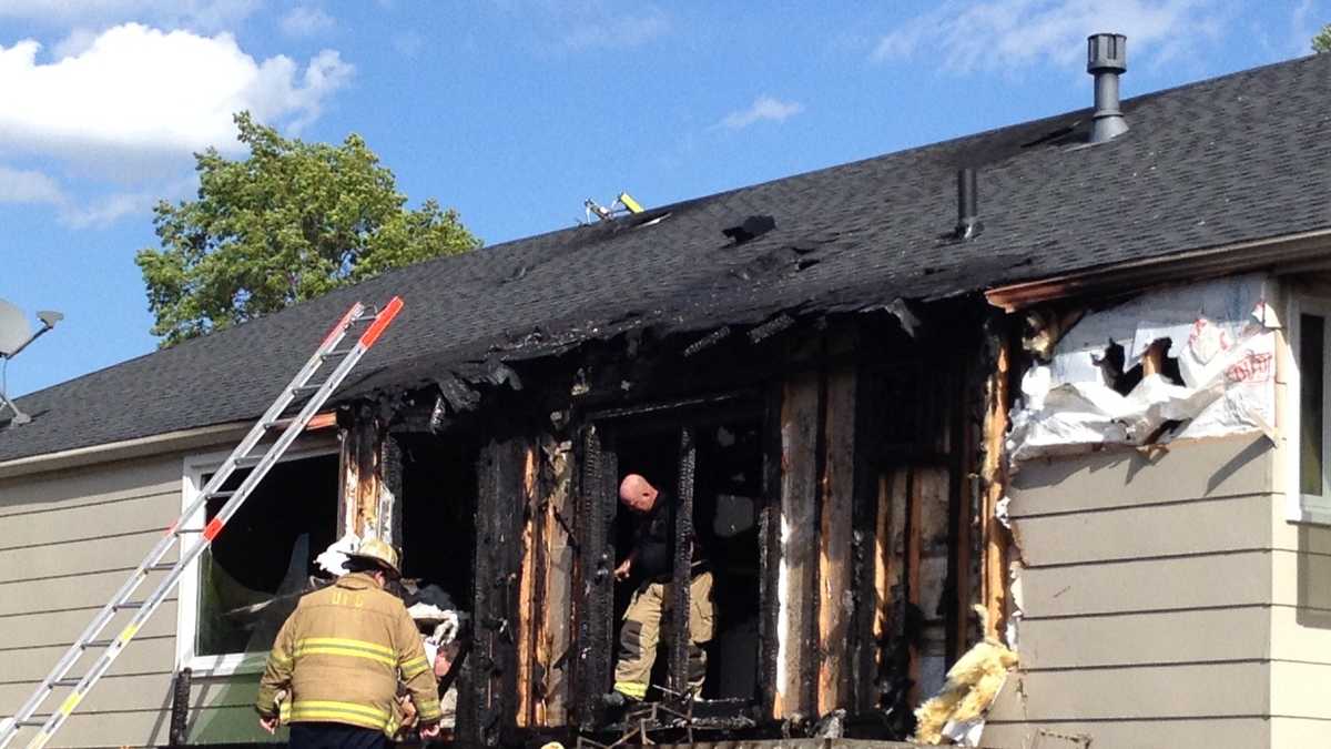 Firefighters report fire shooting out roof
