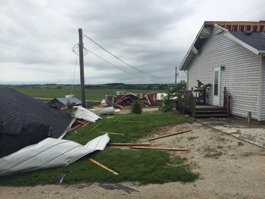 Photos: Possible tornado rips into Iowa farm