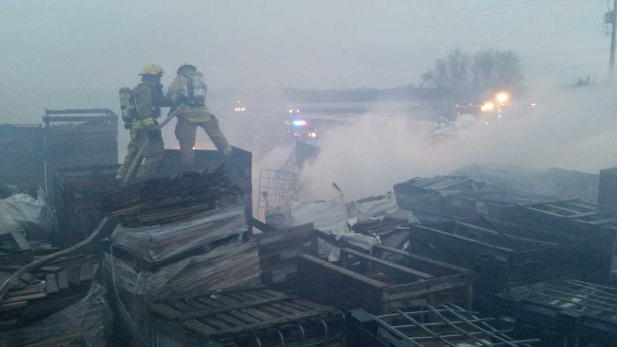 Multiple departments help fight pallet fire