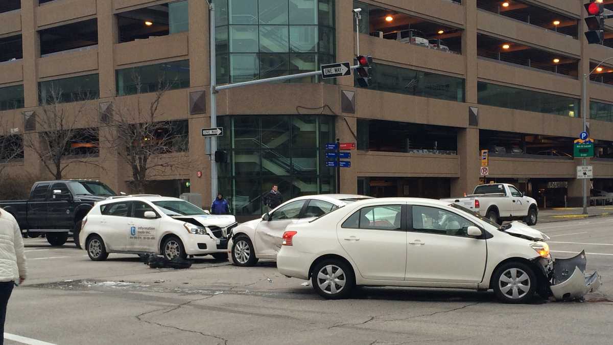 Cars crash head-on during downtown AM commute