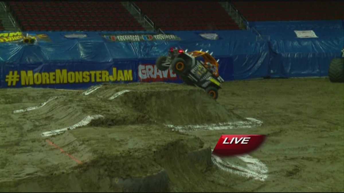 Emmy Victor takes ride in 'mini' monster truck