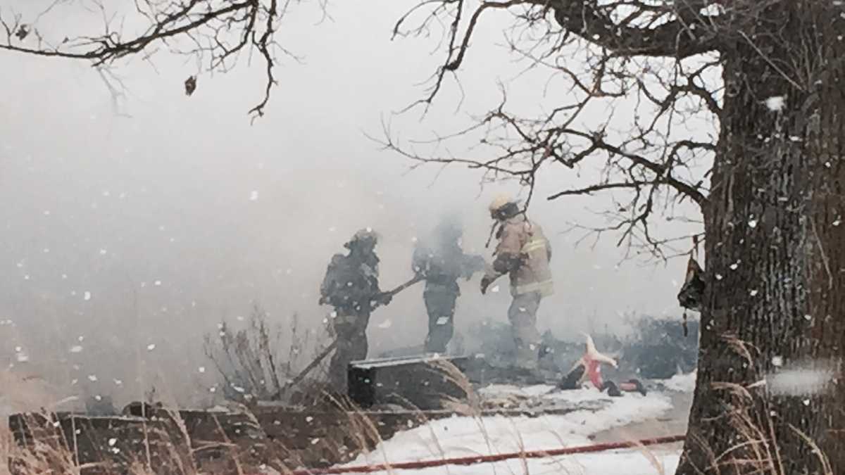 PHOTOS: Firefighters battle fire in blizzard