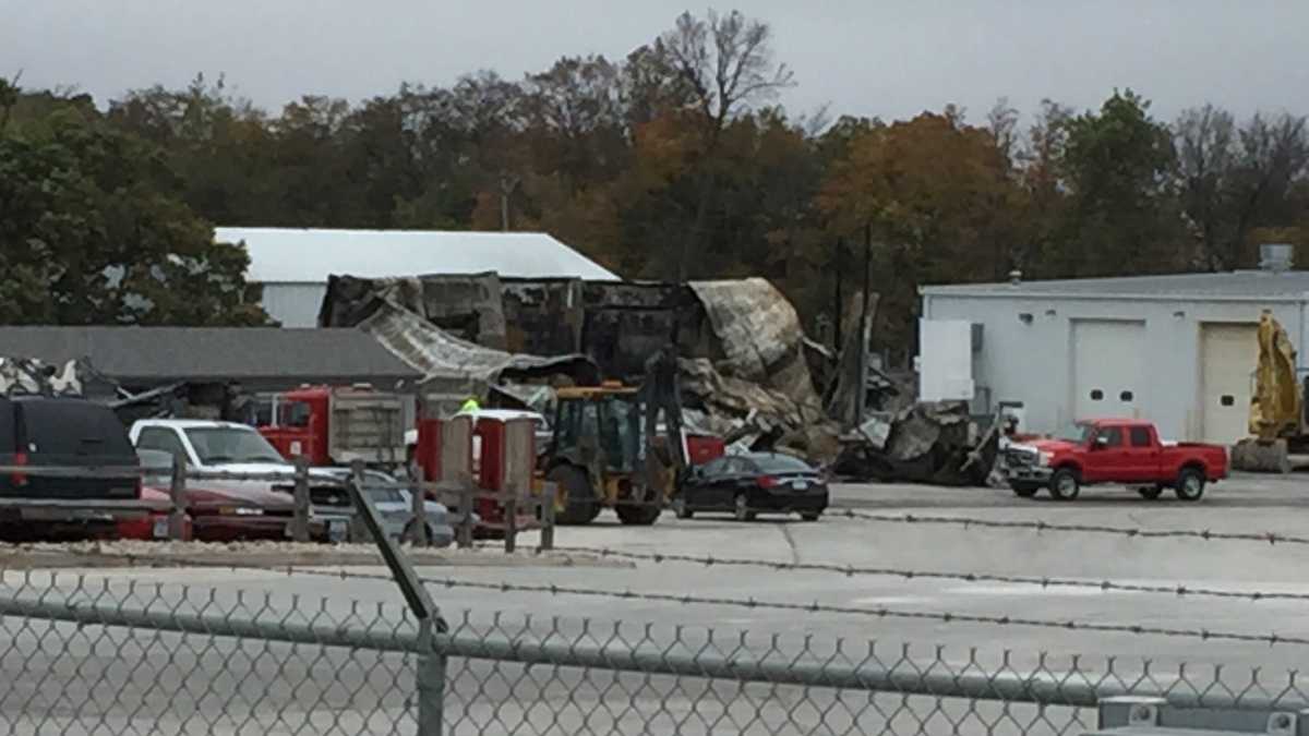 Several explosions cause large structure fire, officials say