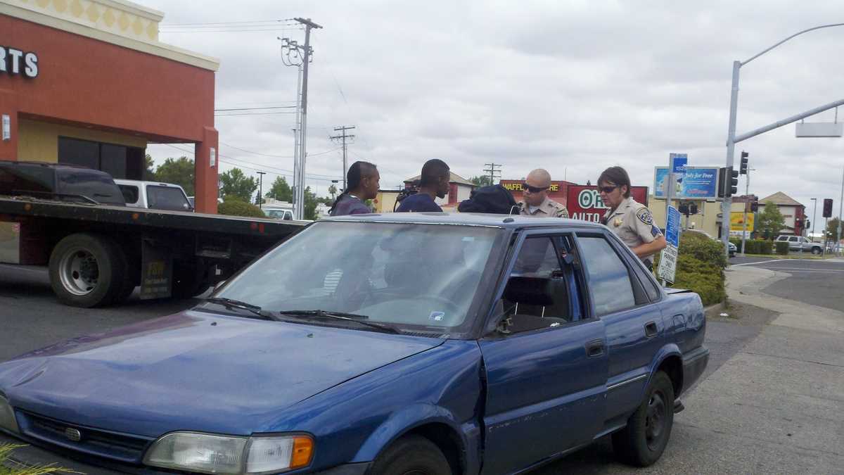 Photos: Man jumps into car window as would-be thief attempts to flee