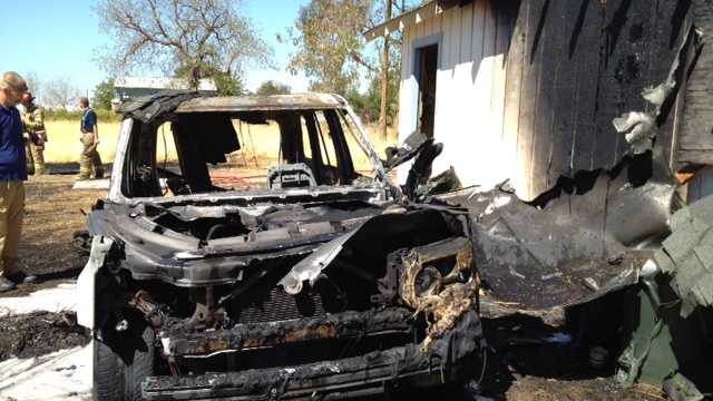 Photos from the field: Building, Range Rover burn in fire