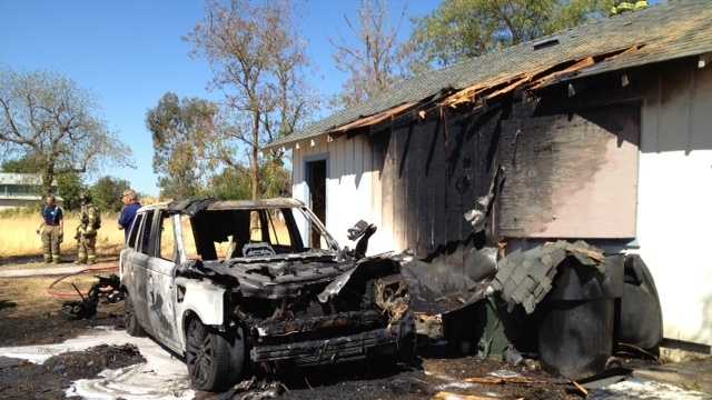 Photos from the field: Building, Range Rover burn in fire