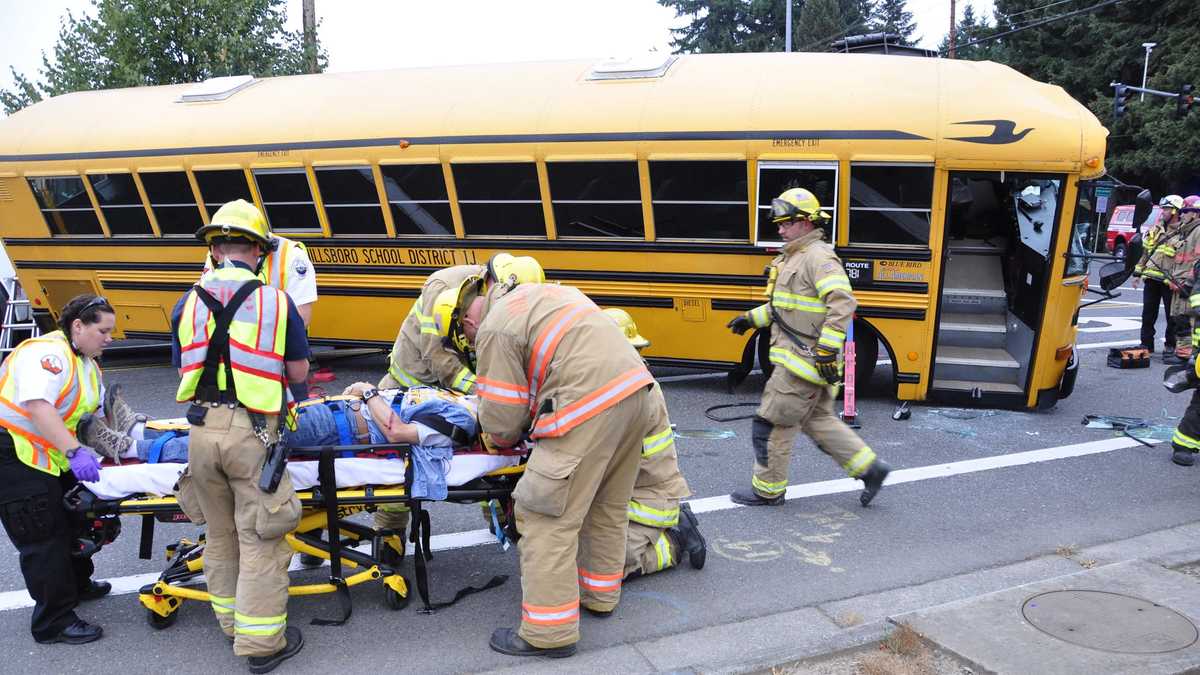 Photos: Oregon school bus crashes into crane