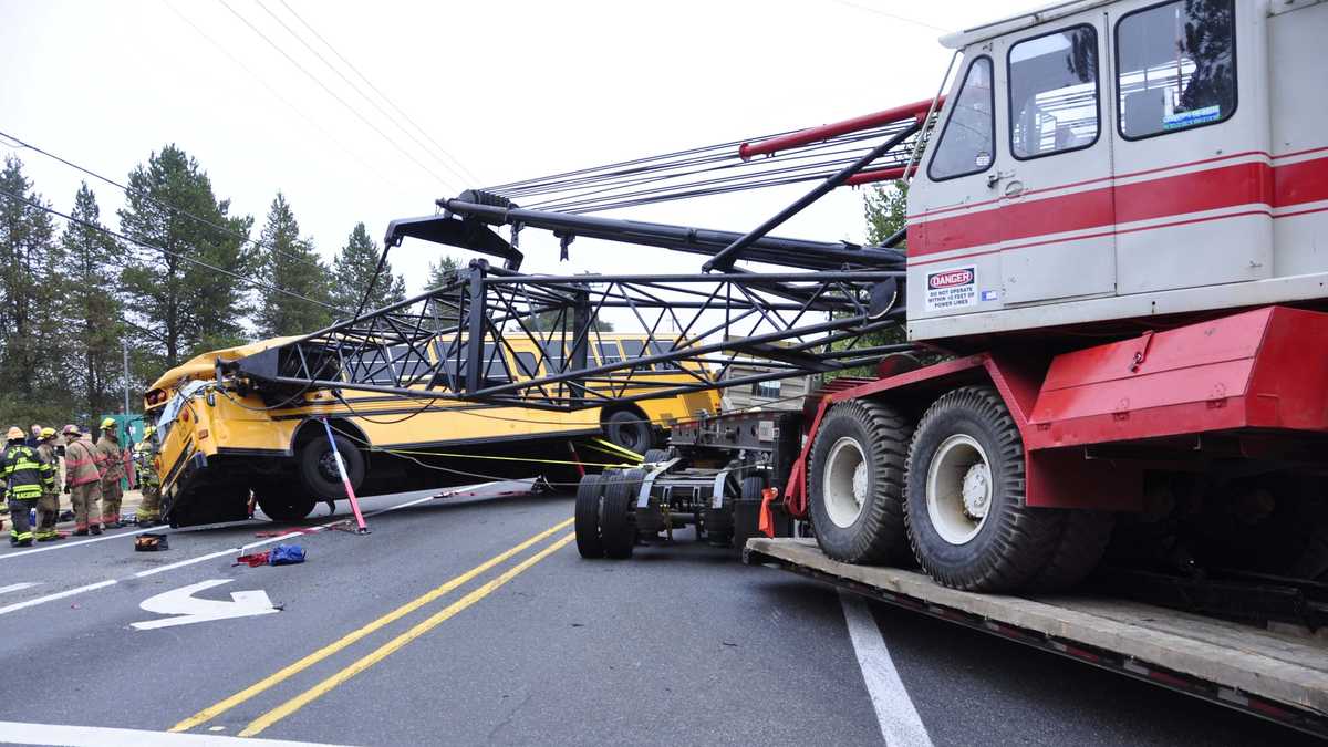 Photos: Oregon school bus crashes into crane