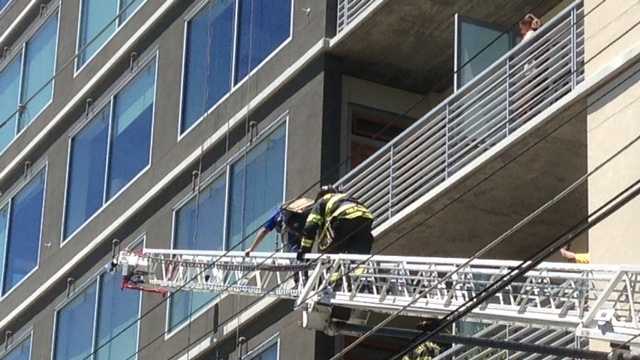 Firefighters rescue window washer from 3rd floor of downtown building