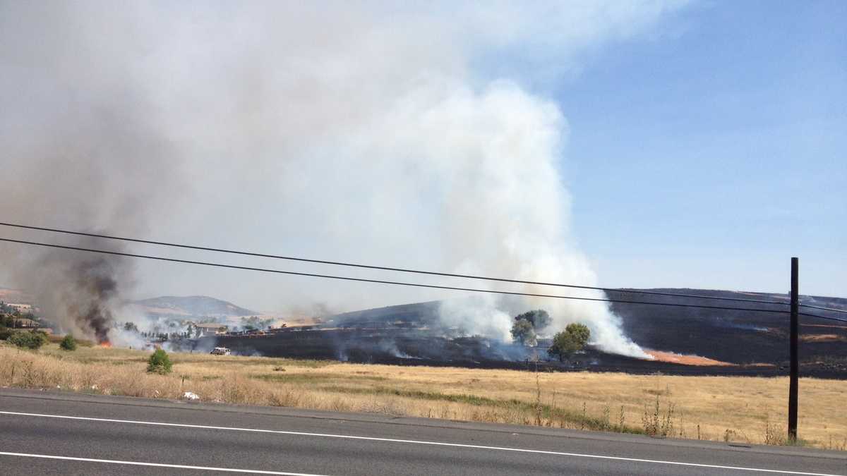 Photos: Grass fire burns off Hwy. 50 near Folsom