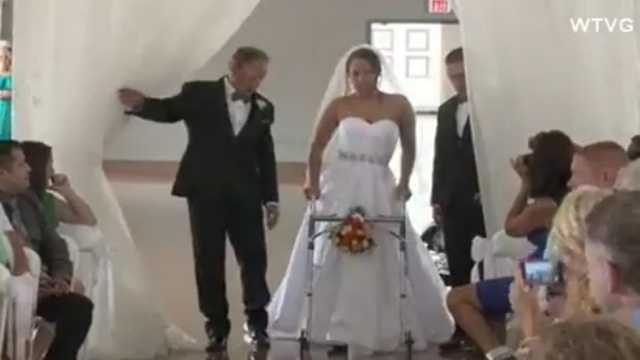 Paralyzed bride walks down the aisle