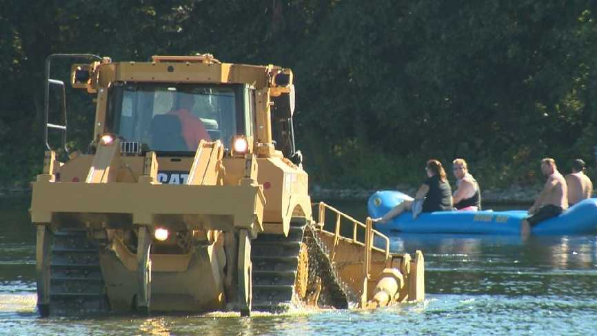 Photos: Construction equipment in river draws attention