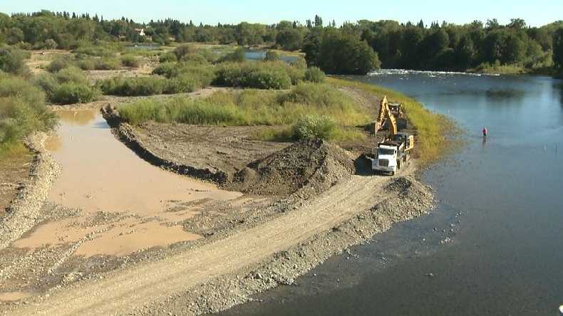Photos: Construction equipment in river draws attention