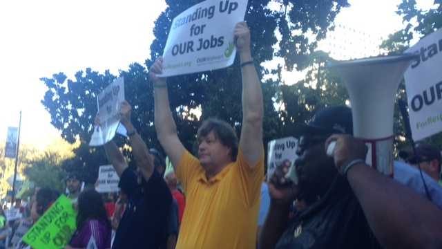 Photos: Walmart workers protest at Cesar Chavez Park