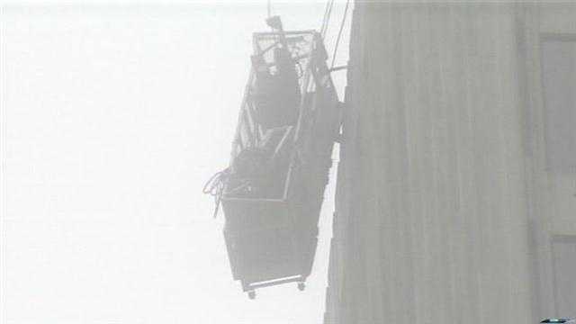 Dangling window washing rig in SF secured