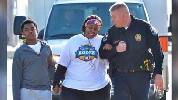 Inspiring photos of cop helping runner finish 10k go viral
