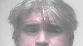 Accused bank robber signs own name on note demanding $10K