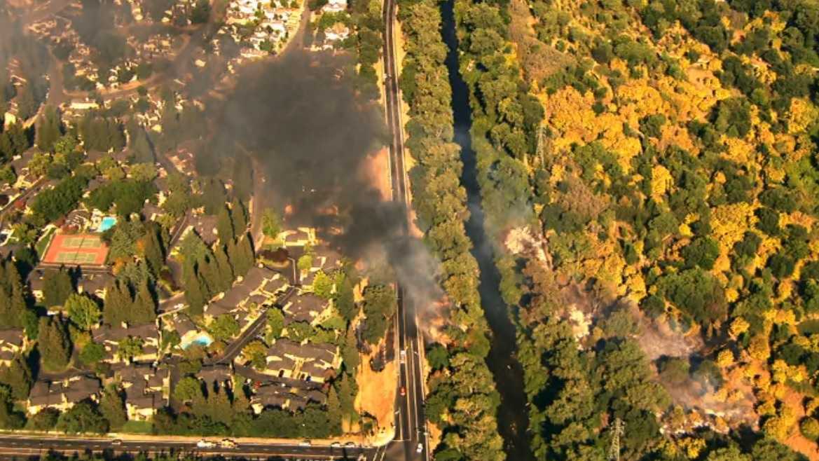 Fire that jumped Garden Highway contained