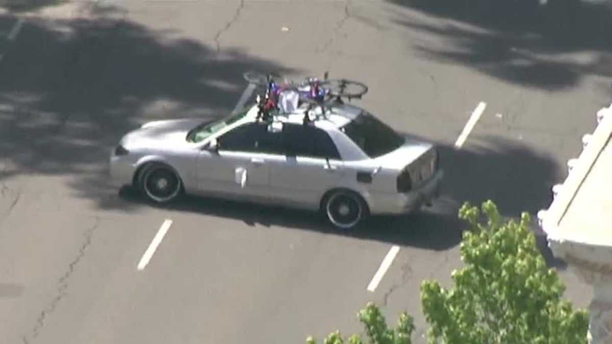 PHOTOS: Person barricaded in car blocks road in front of Capitol