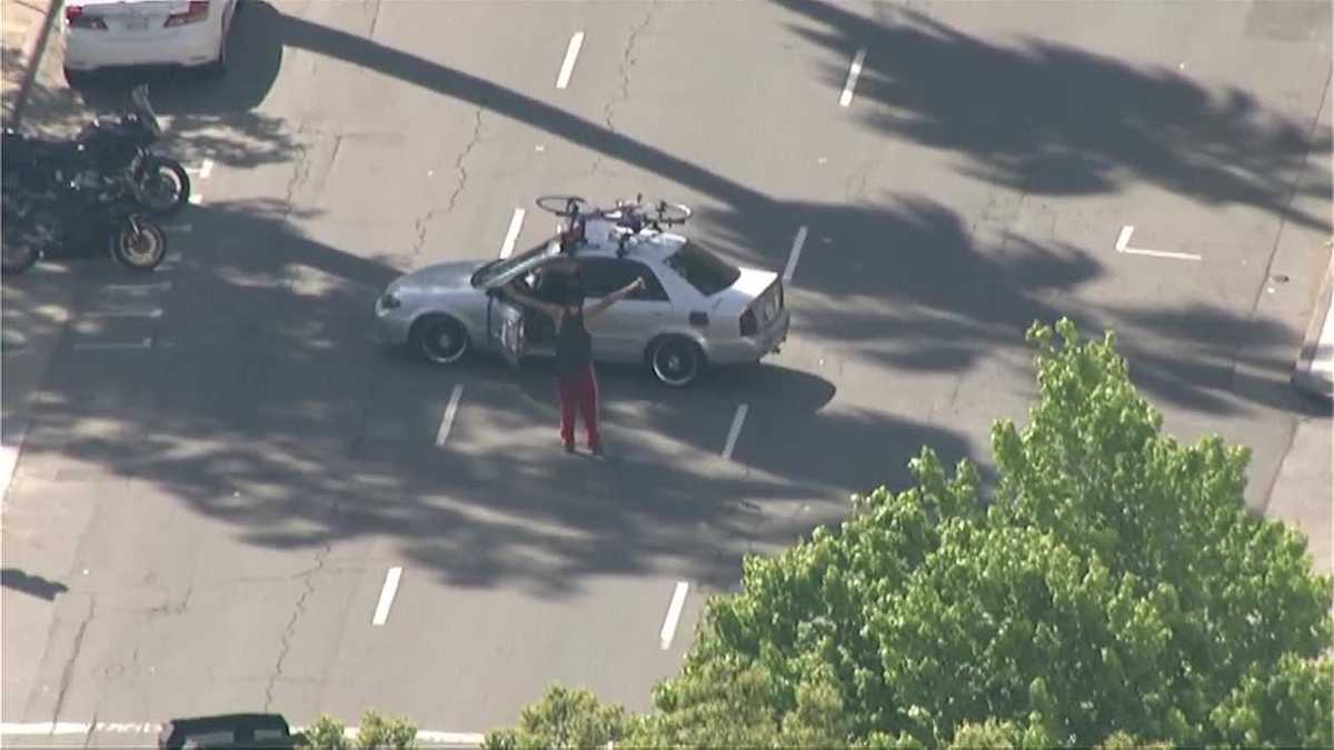 PHOTOS: Person barricaded in car blocks road in front of Capitol