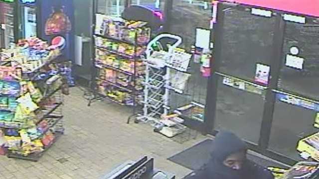 Photos: Surveillance shows convenience store robbery
