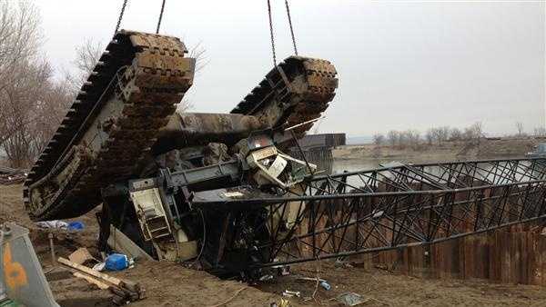 Photos: One injured after crane topples