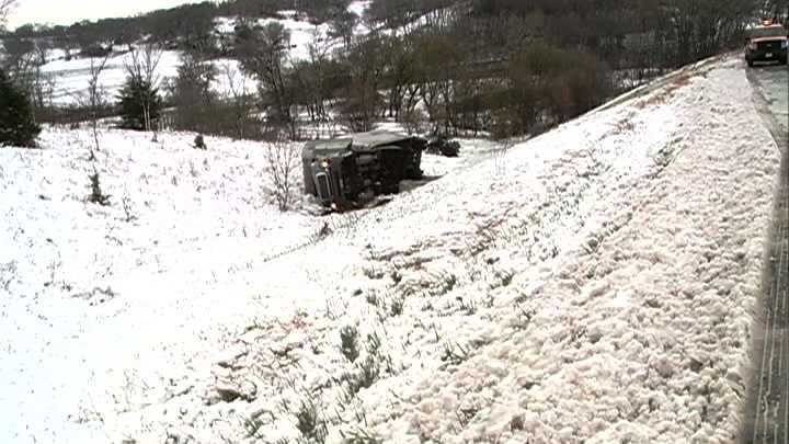 Photos: Semi slides off Interstate 680