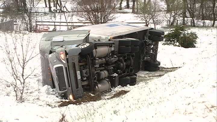 Photos: Semi slides off Interstate 680