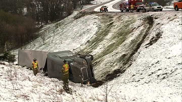 Photos: Semi slides off Interstate 680