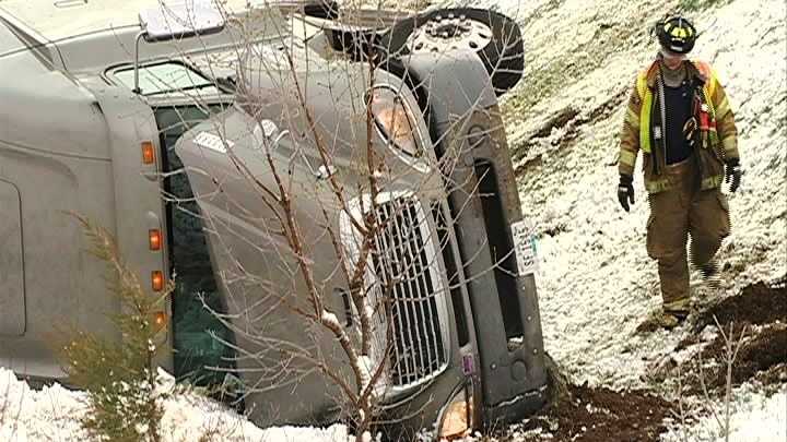 Photos: Semi slides off Interstate 680