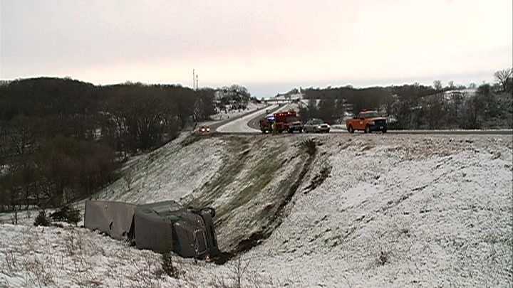Photos: Semi slides off Interstate 680
