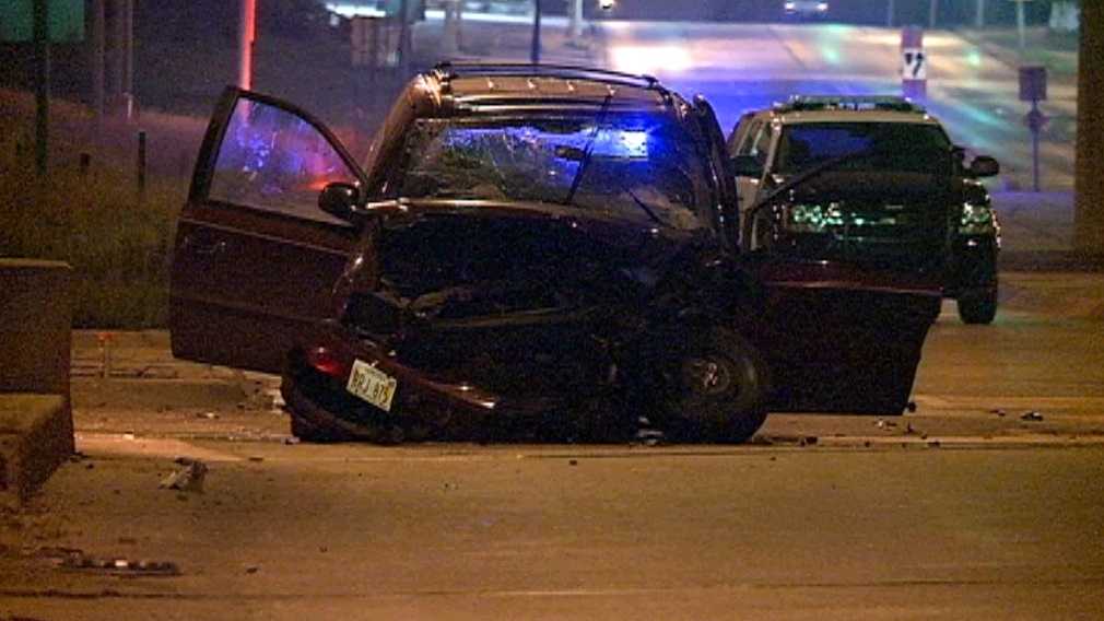 Police: Driver runs red light, collides with minivan