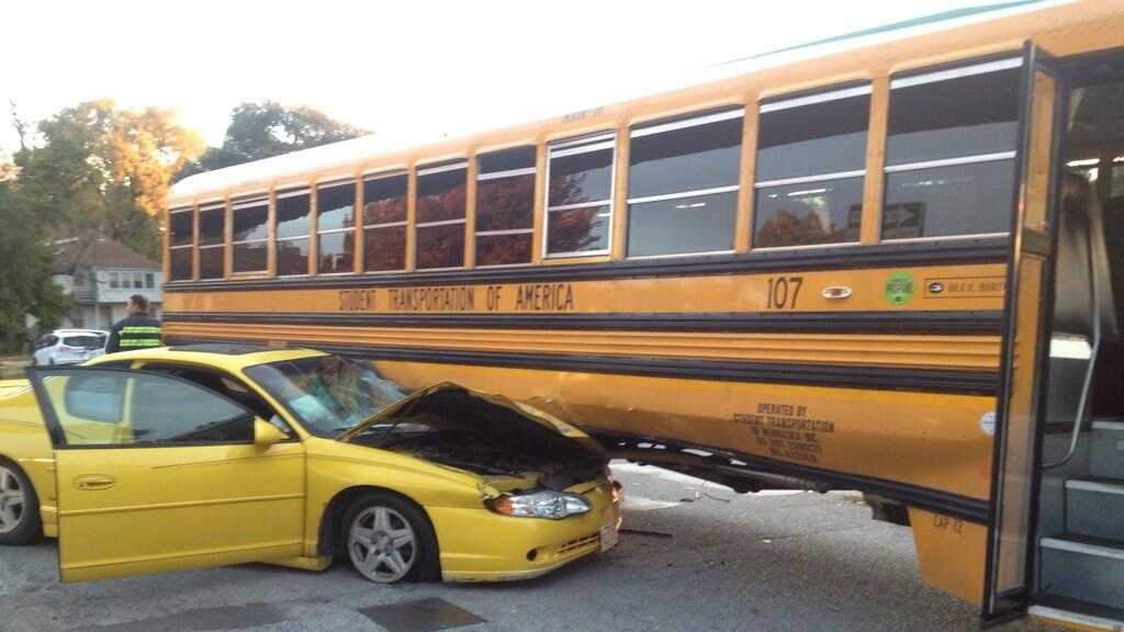 1 injured in car vs. school bus crash