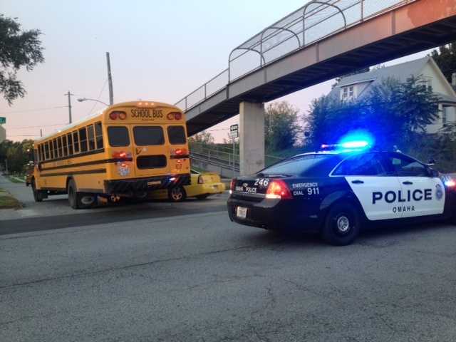 Photos: 1 hurt in car vs. school bus crash