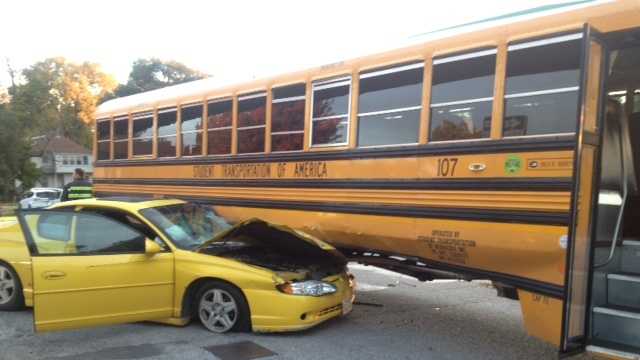 Photos: 1 hurt in car vs. school bus crash