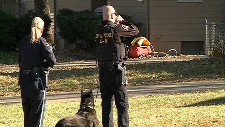 Photos: Police search for suspect