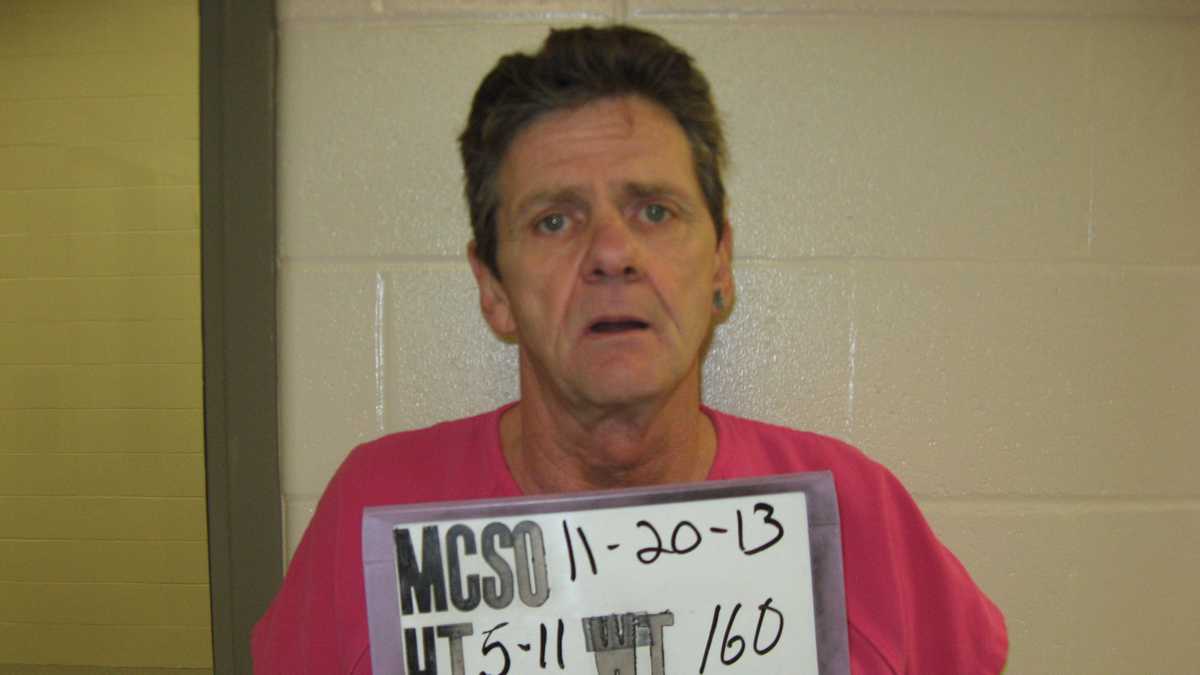 Man accused of threatening to set woman on fire turns himself in