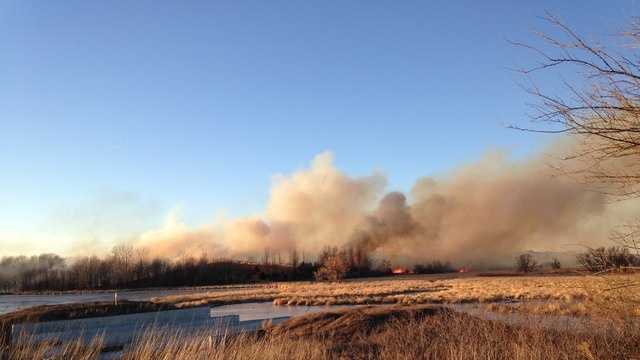 Photos: More than 300 acres burned in brush fire