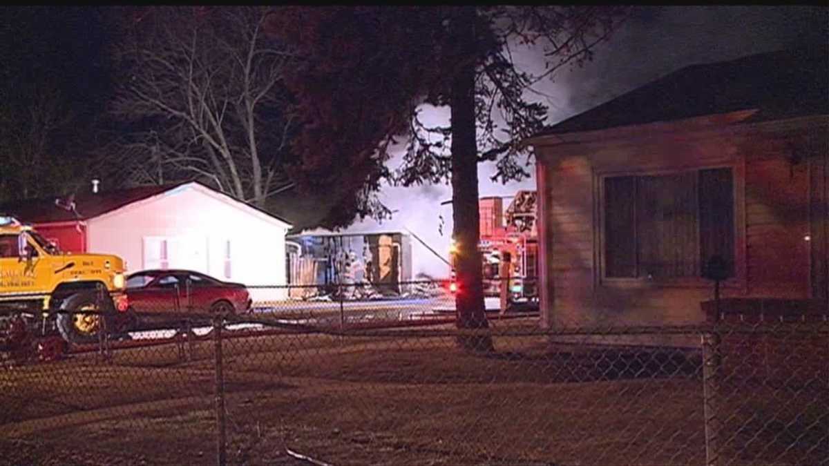 Crews battle Carter Lake garage fire