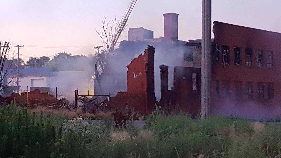 Warehouse fire damages building, causes partial collapse in south Omaha