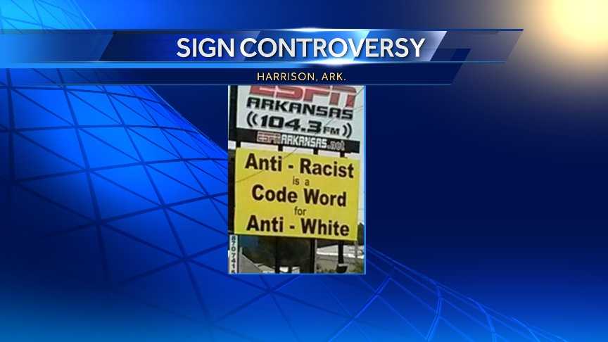 Protesters gather near Harrison racist billboard