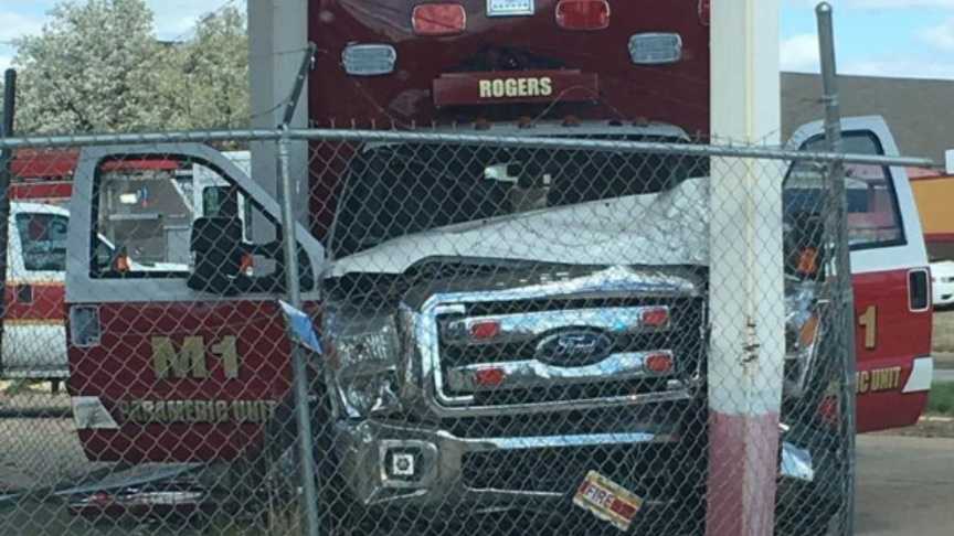 Ambulance damaged after crash in Rogers