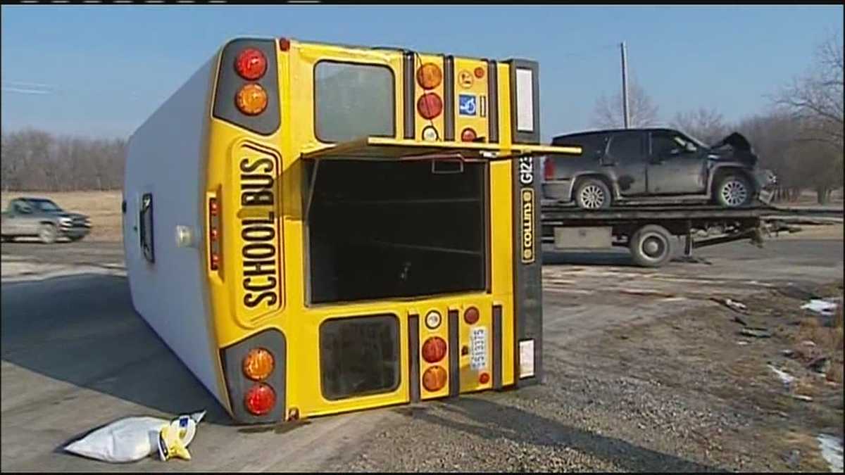 School bus rolls over after colliding with SUV