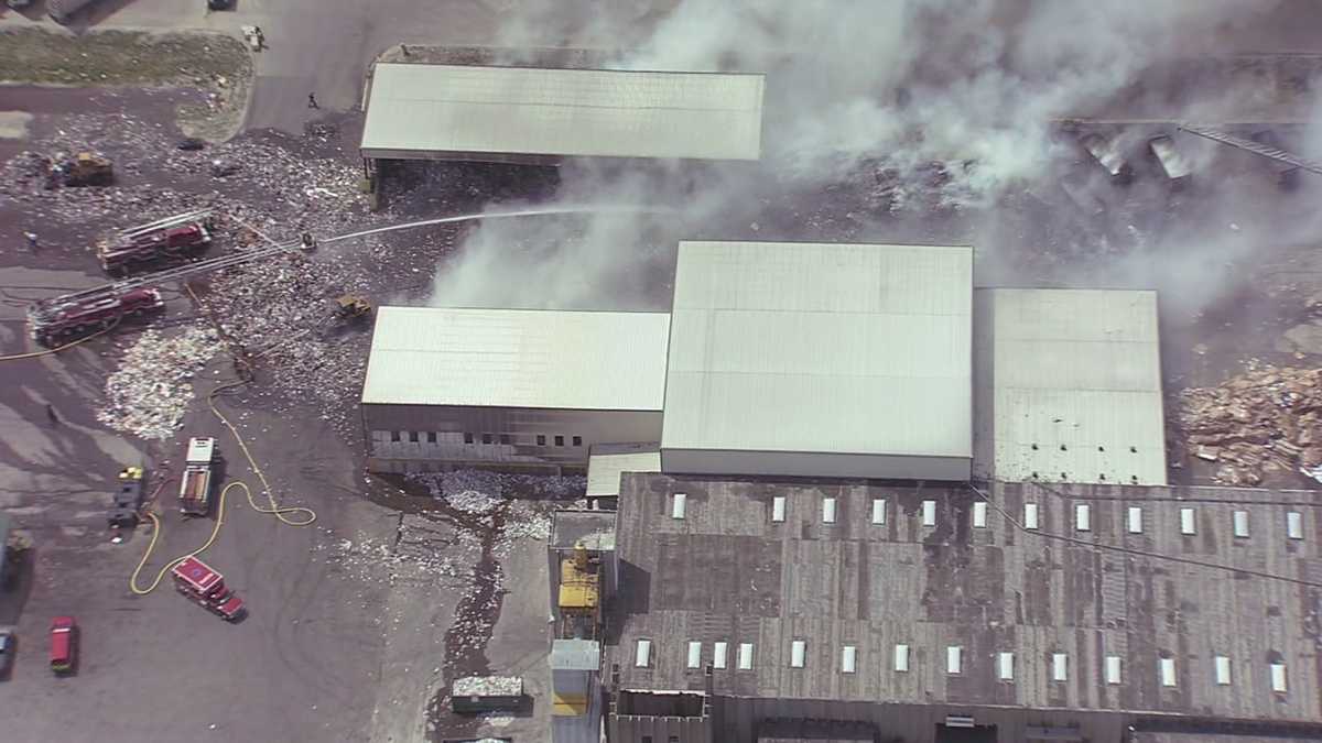 Images: Fire slowly burns at metro recycling plant