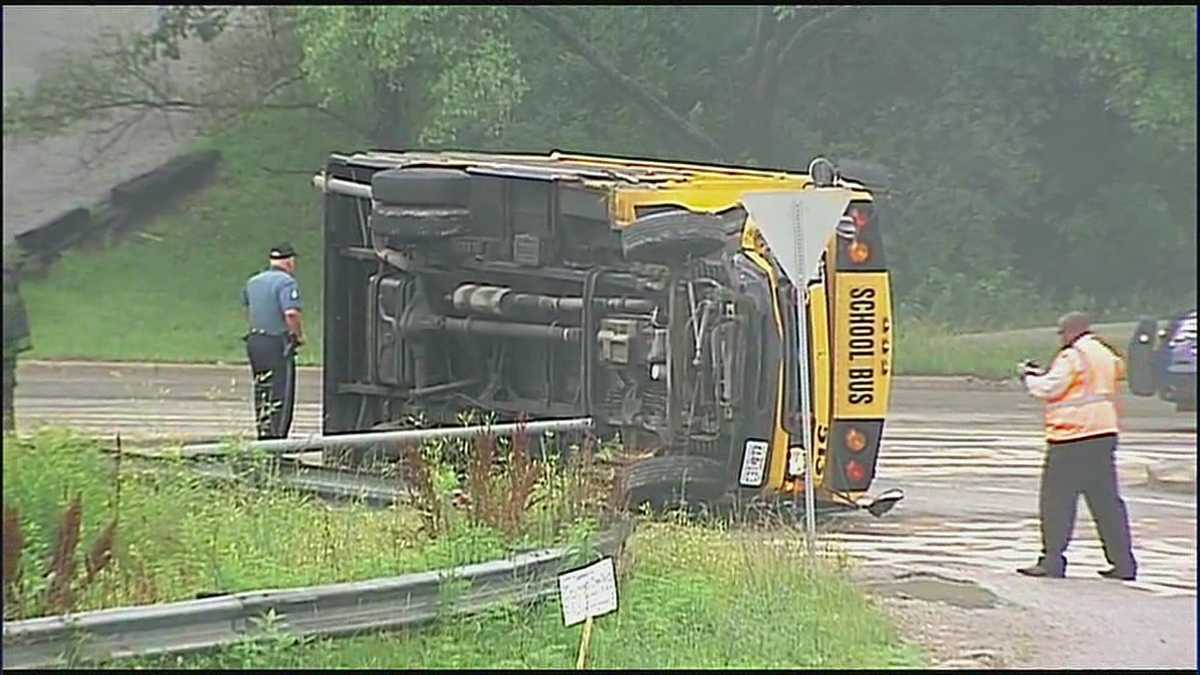 2 hurt in rollover crash involving school bus