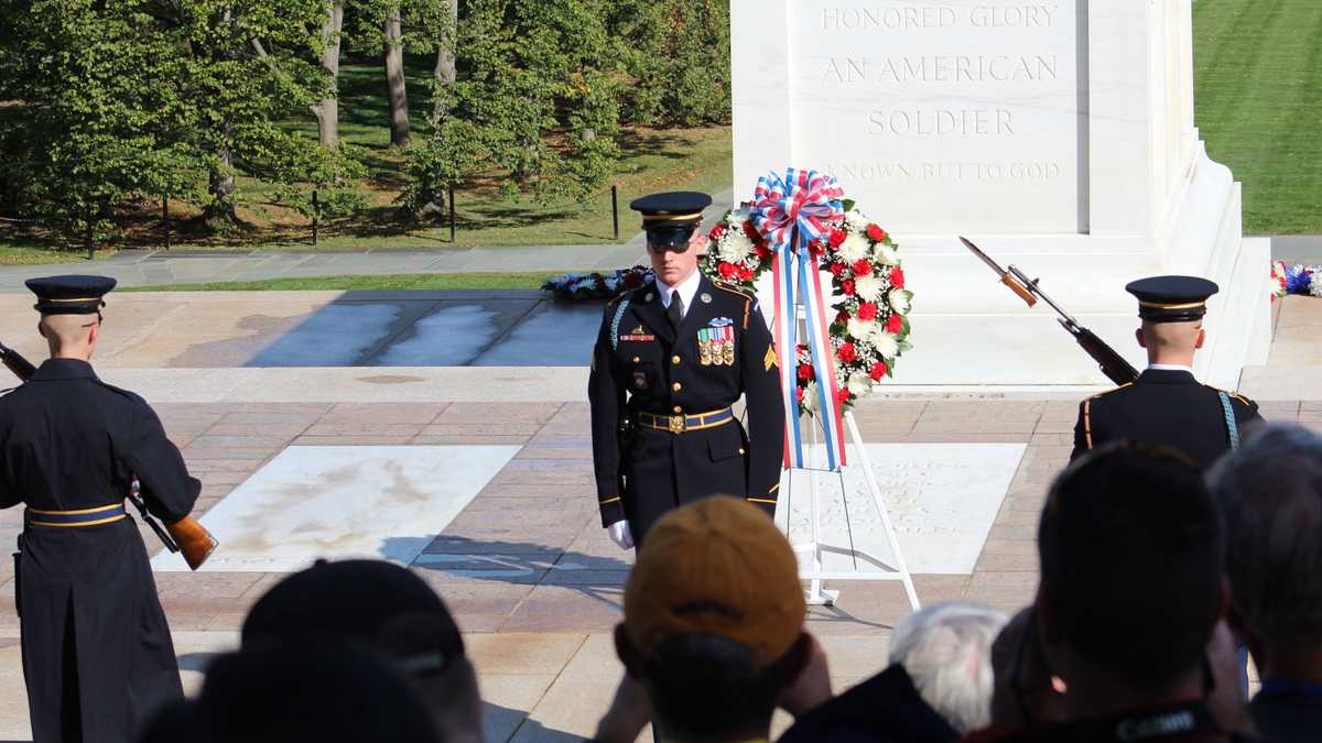Local veterans lay a wreath at the Tomb of the Unknown Soldier