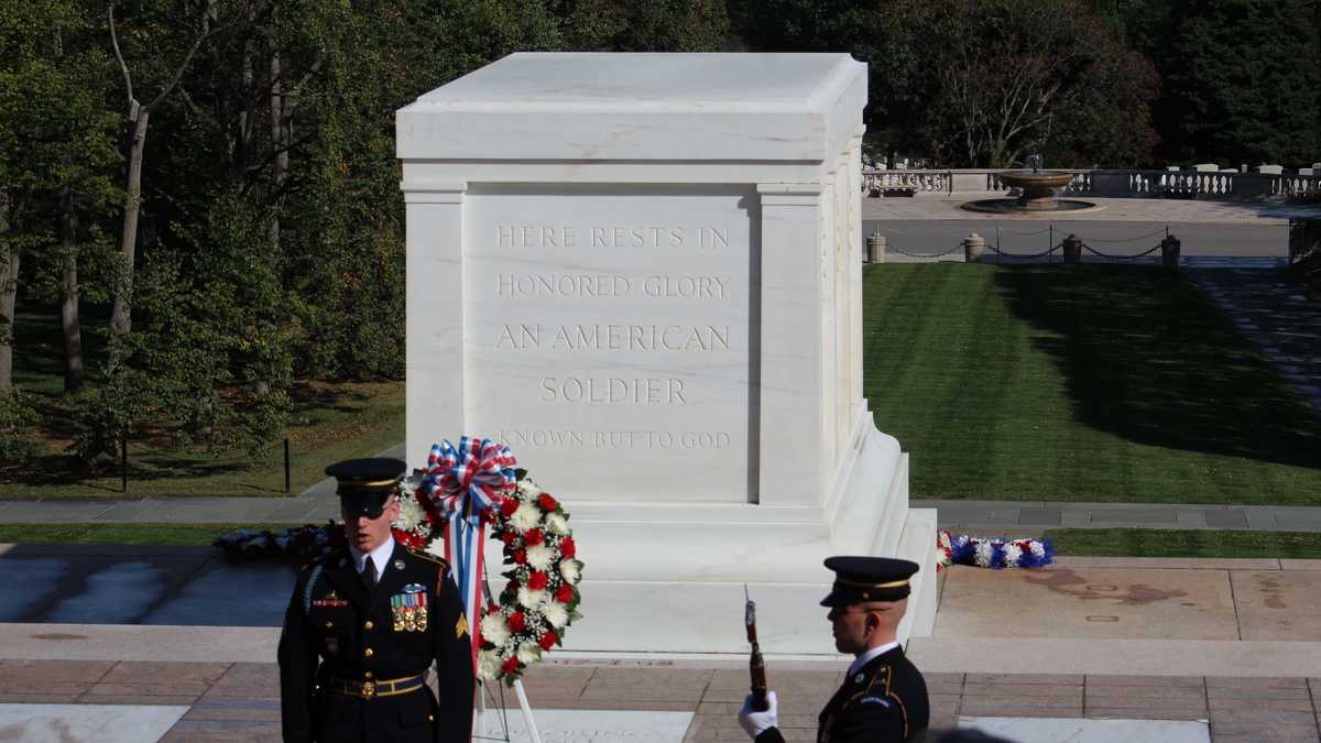 Local veterans lay a wreath at the Tomb of the Unknown Soldier