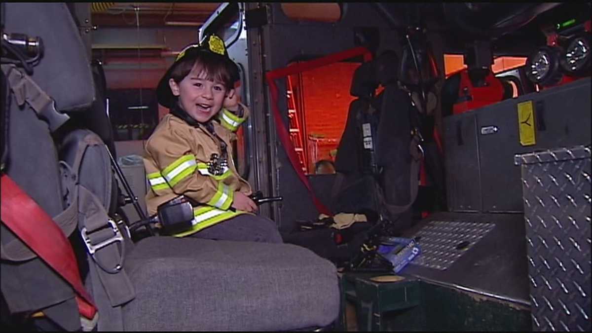 Young firefighter fan gets personal visit to KC fire station